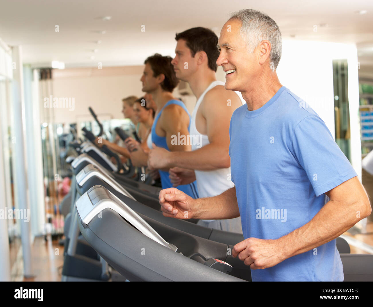 Older man running treadmill hi-res stock photography and images - Alamy