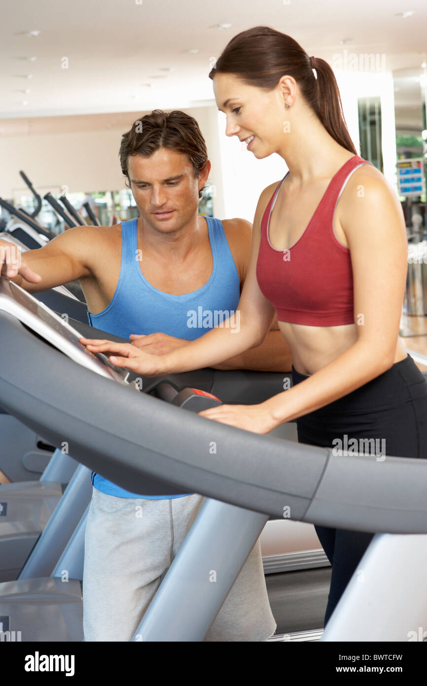Woman,Personal Trainer, Running Machine,Gym Stock Photo - Alamy