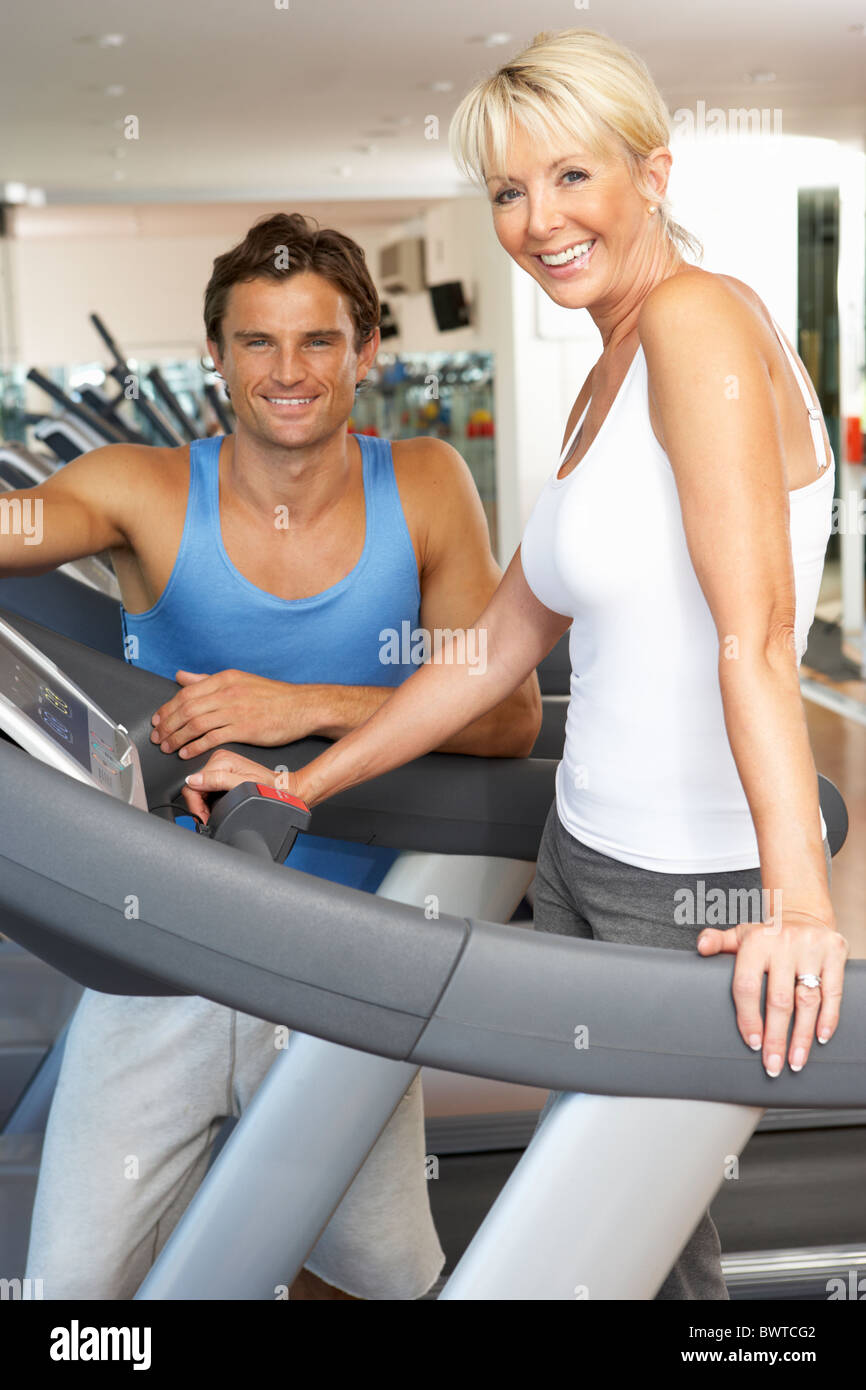 Senior Woman,Personal Trainer, Running Machine,Gym Stock Photo - Alamy