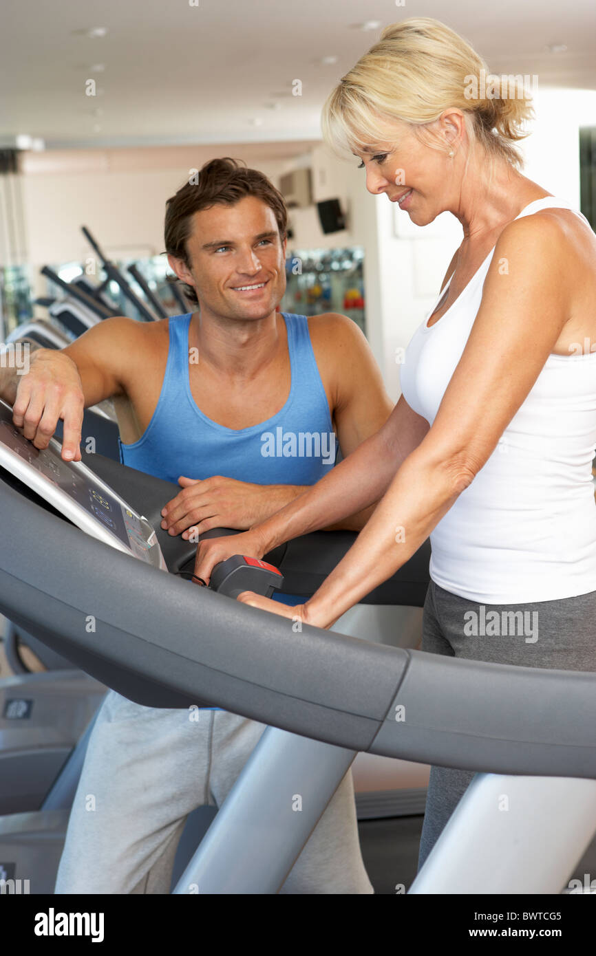 Woman and personal trainer hi-res stock photography and images - Alamy