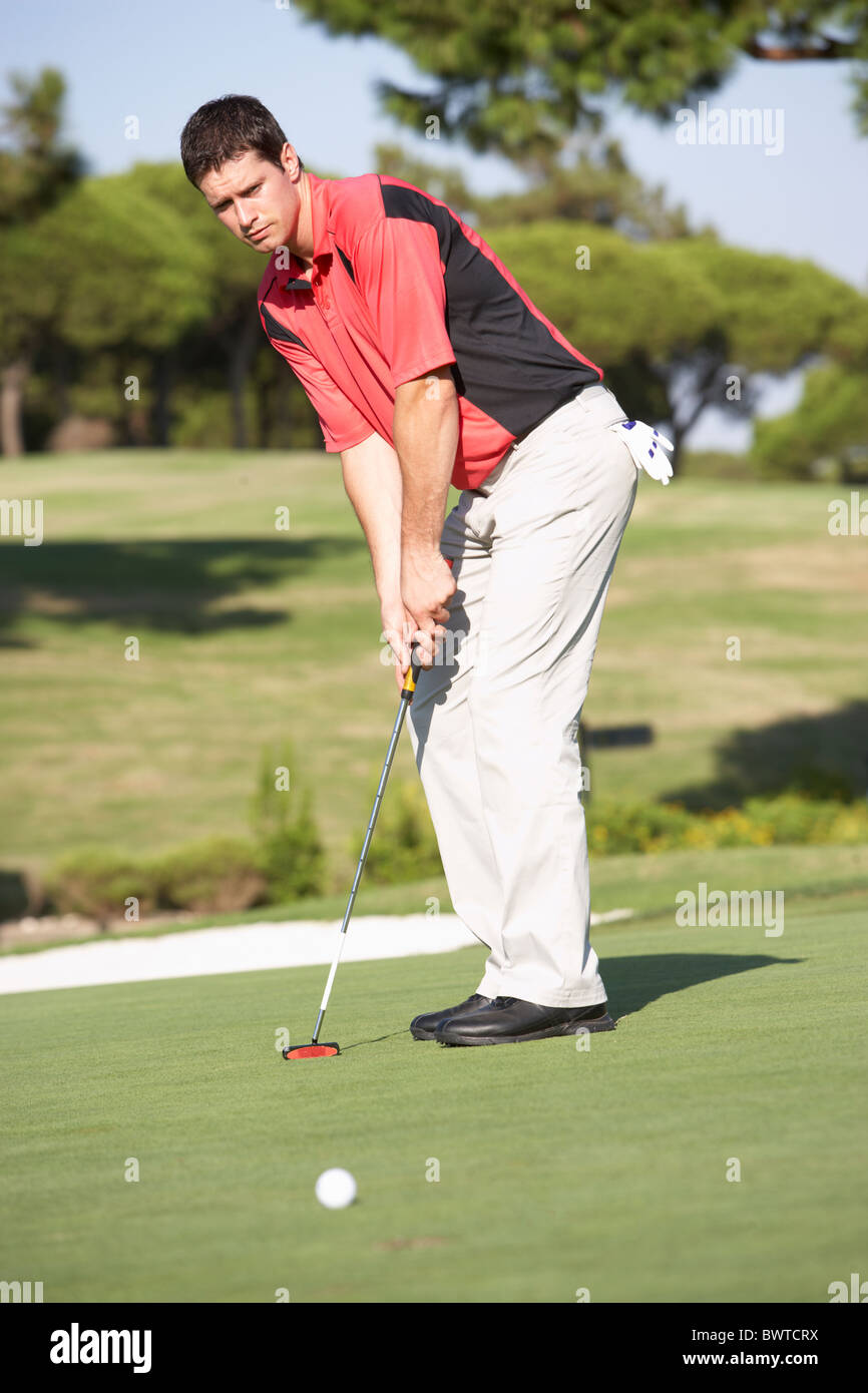 Vertical of golfer putting hi-res stock photography and images - Alamy