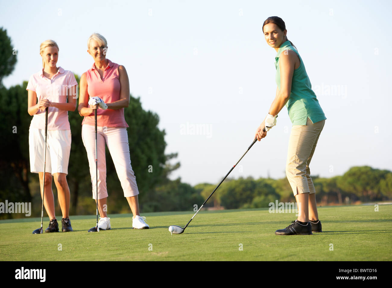 Group, Female Golfers Teeing,f On Golf Course Stock Photo - Alamy