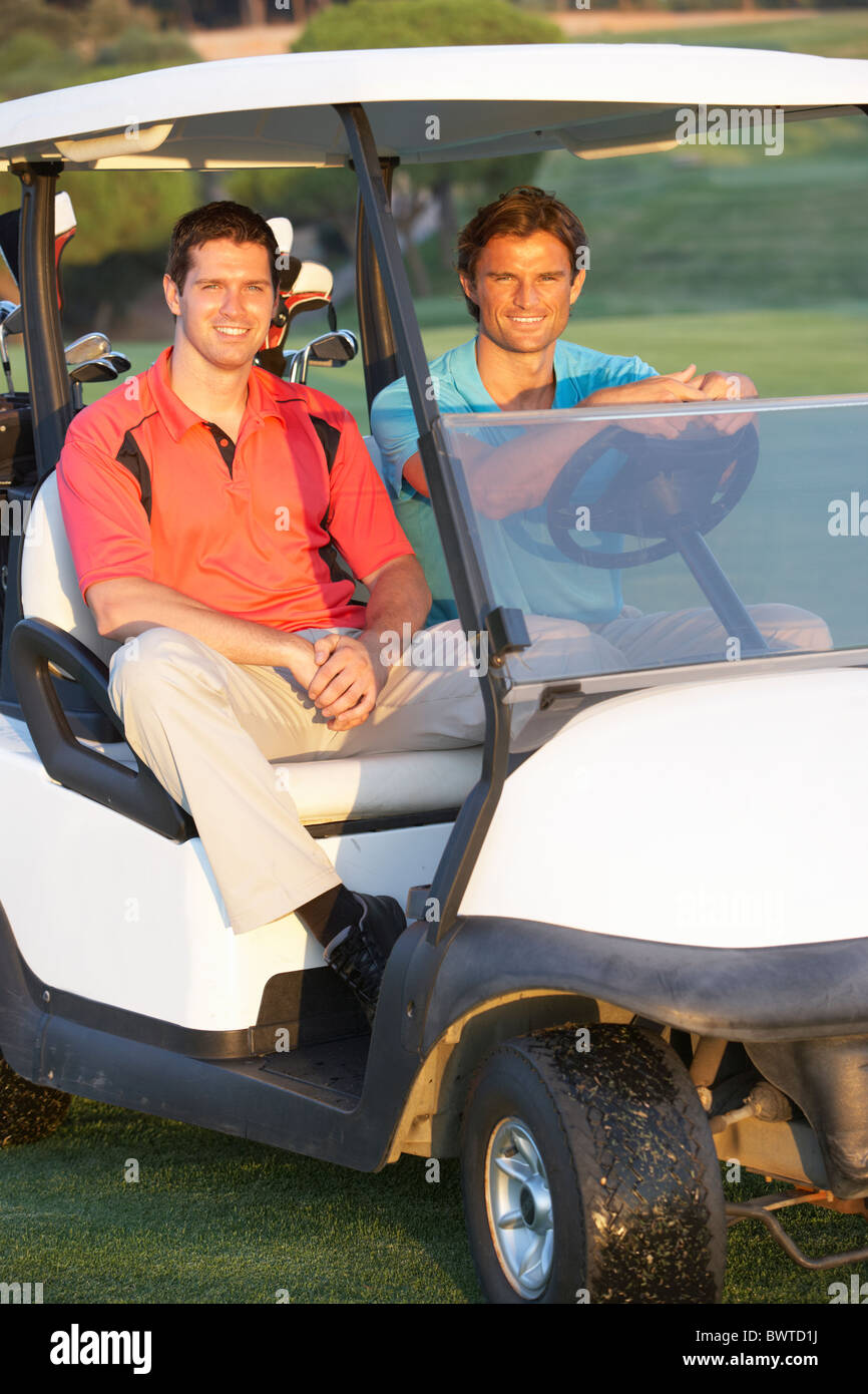 Two male golfers riding golf hi-res stock photography and images - Alamy
