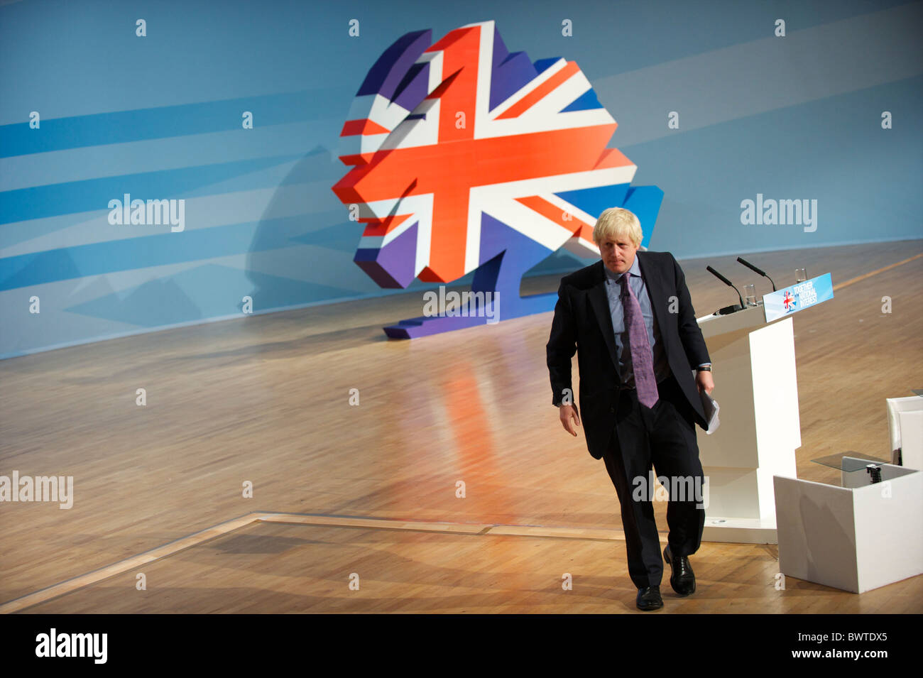 London Mayor Boris Johnson exits the stage to address delegates on the ...