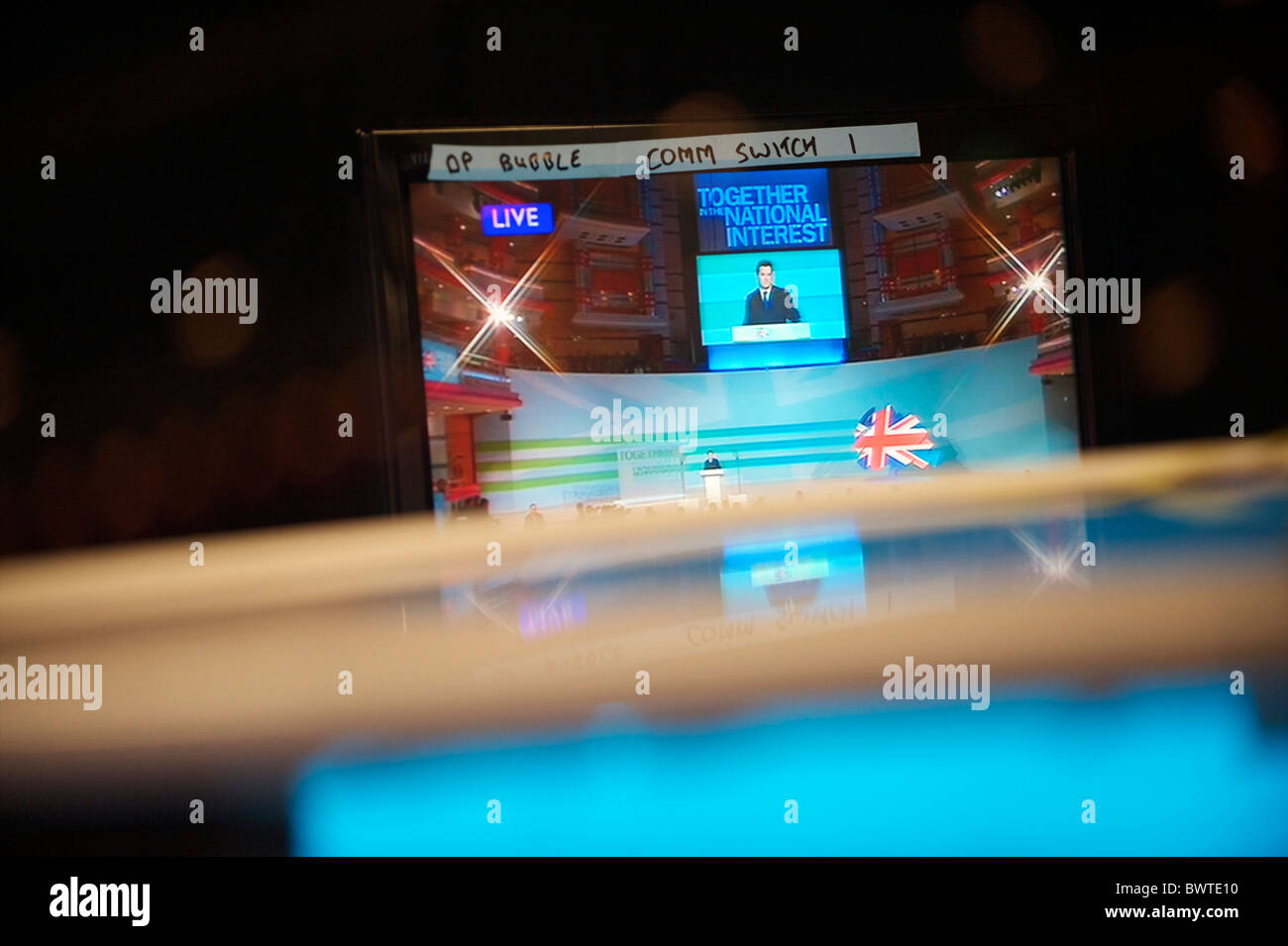 Television monitors within the BBC studios reflect the speech of the ...