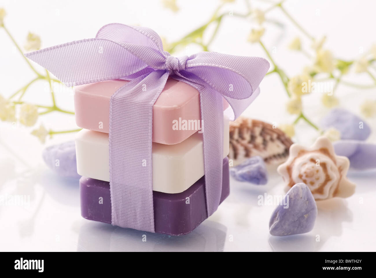 Batch of scanted soap in different colors as closeup with ribbon Stock ...