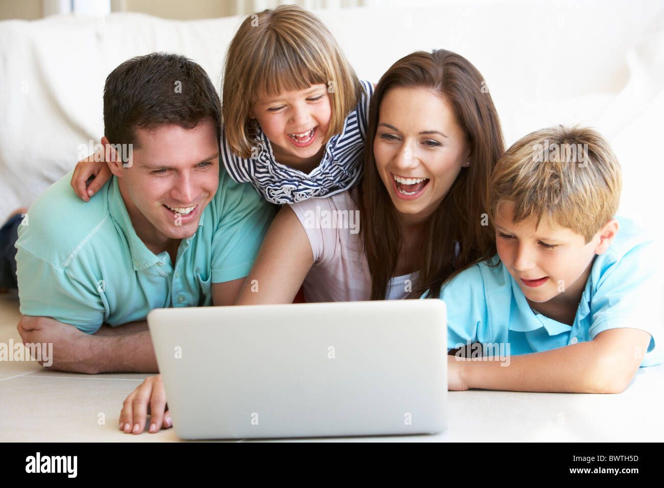 Middle age woman on her laptop computer Stock Photo - Alamy