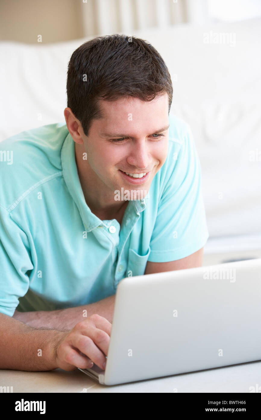 Young woman with girl using laptop computer Stock Photo - Alamy