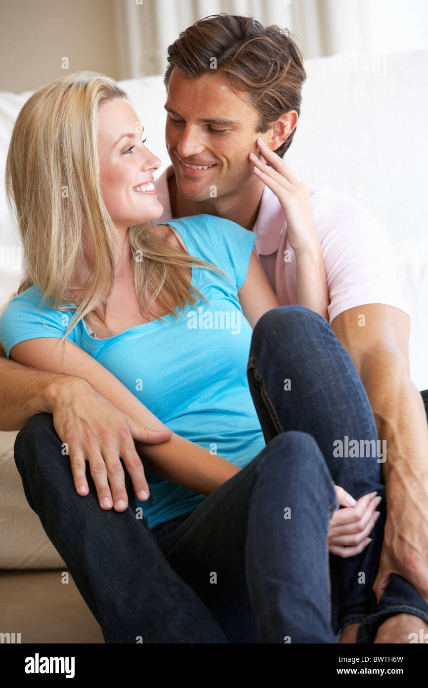 Young couple on laptop computer Stock Photo - Alamy