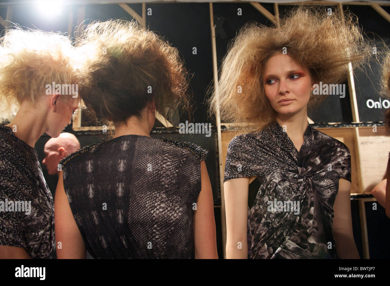Models line up preparing to hit the catwalk the Aminaka Wilmont spring ...