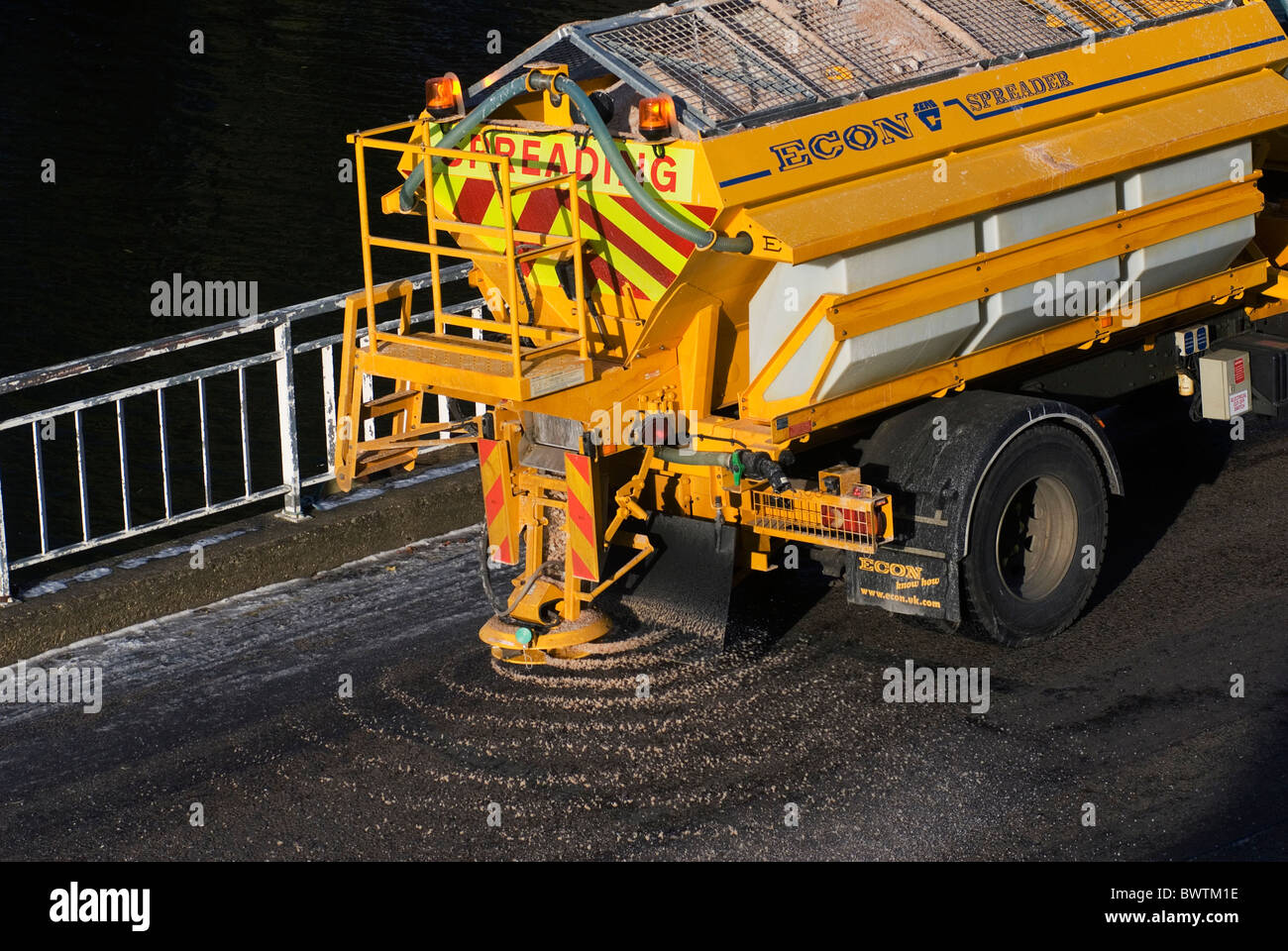 Spreading salt grit hi-res stock photography and images - Alamy