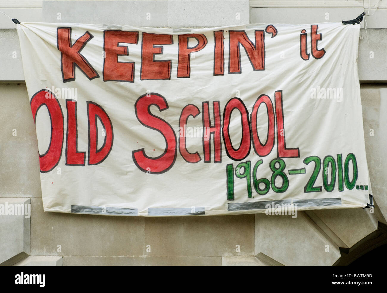 A student protest banner hanging from the Old Schools Building ...
