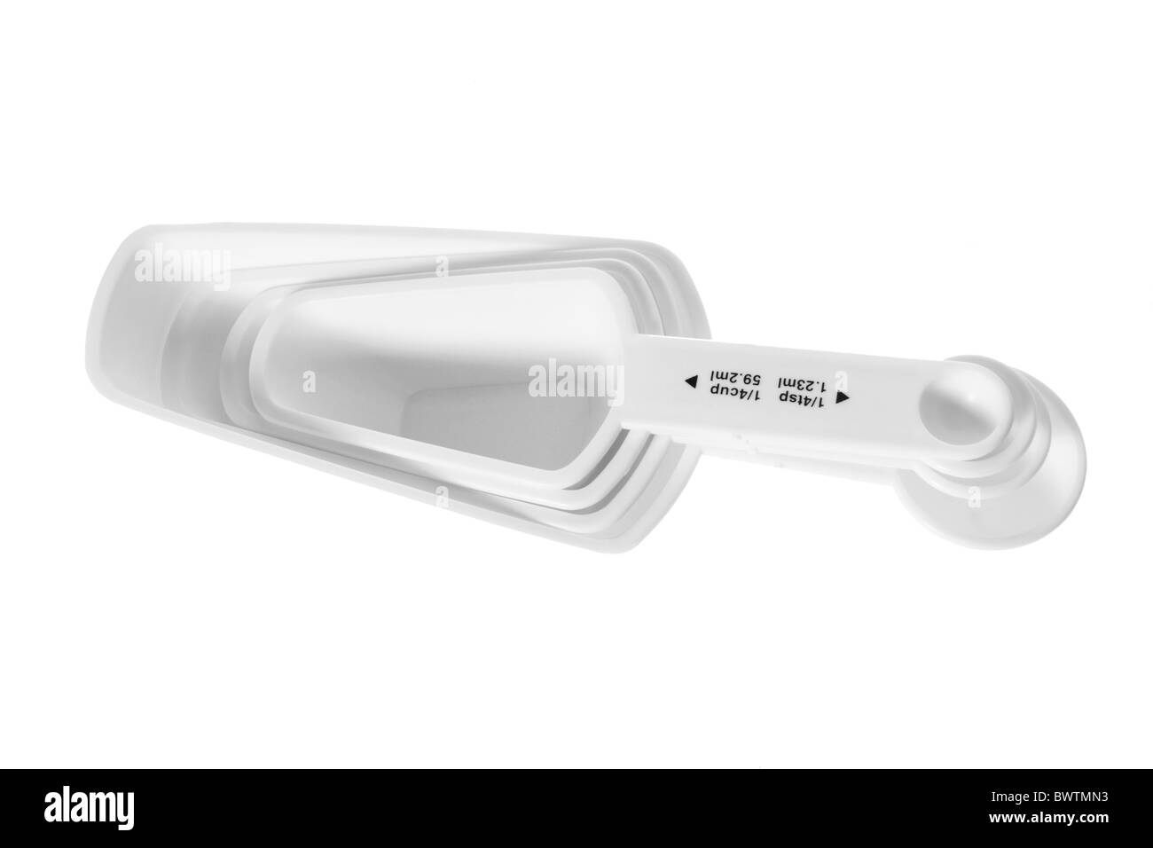 White plastic measuring spoons Black and White Stock Photos & Images ...
