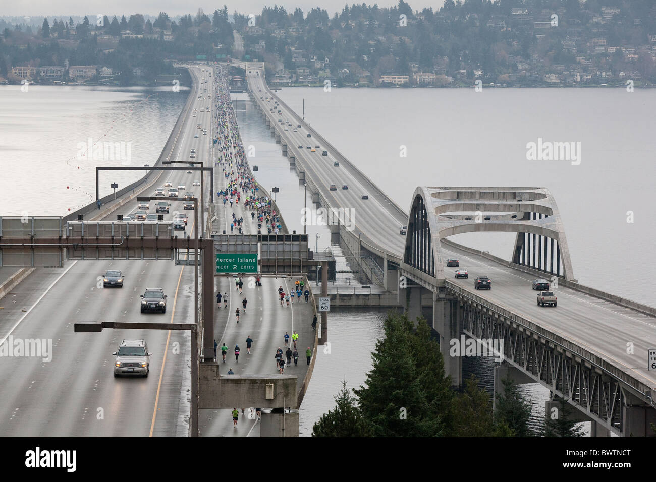 Marathoners on the I-90 floating bridge at the 40th annual Amica ...