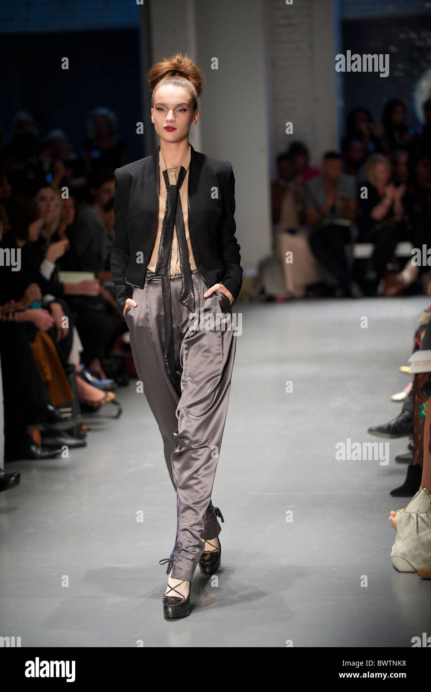 Models exhibit the Bora Aksu spring 2011 collection down the catwalk at ...