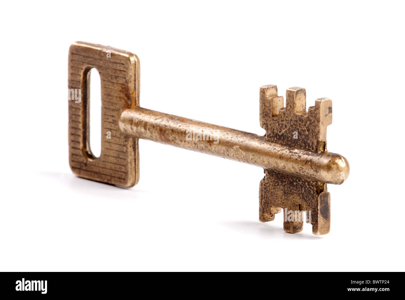 Vintage key on white background Stock Photo - Alamy