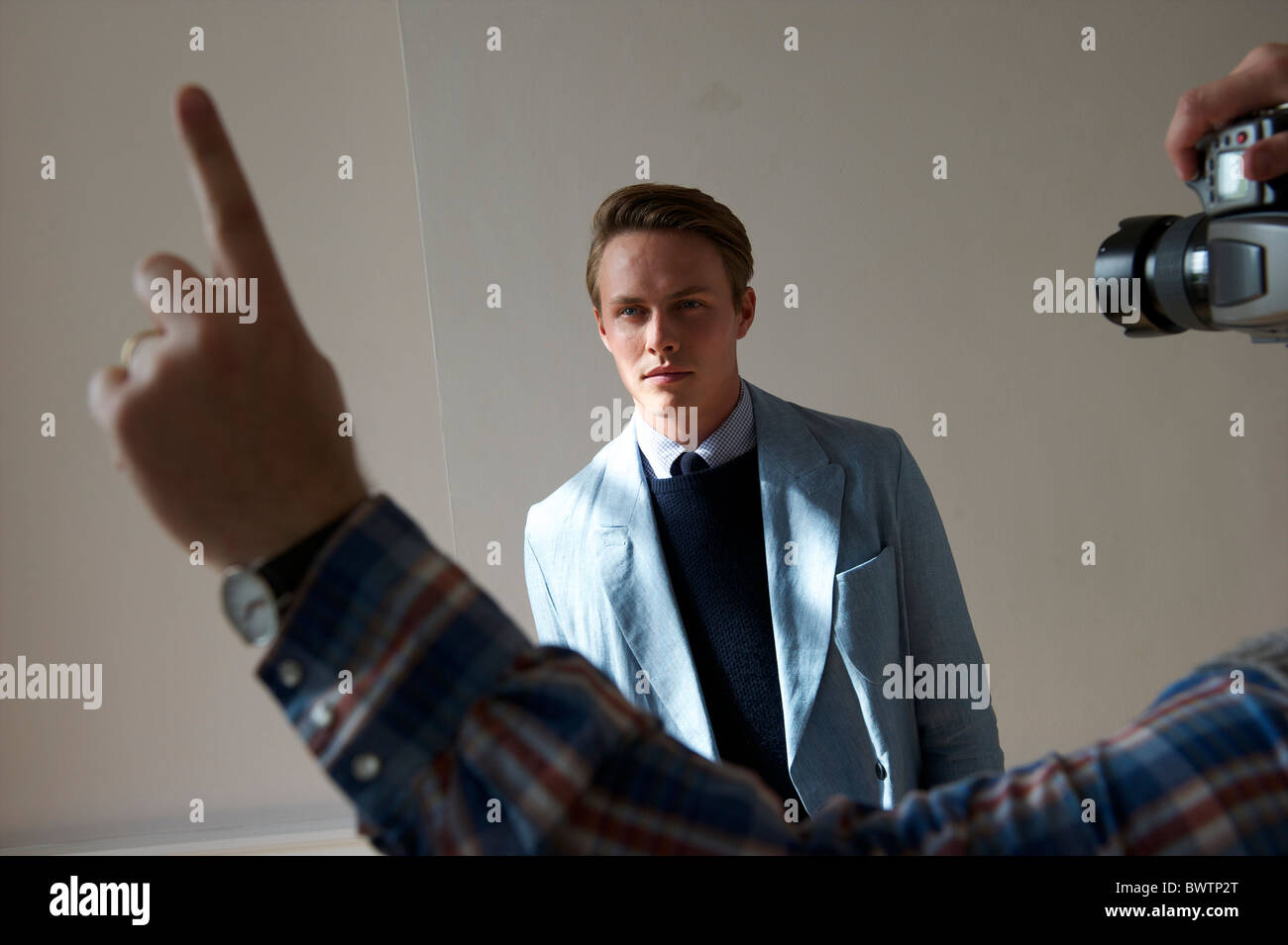 A model poses for a portrait backstage before showing the spring 2011 E ...