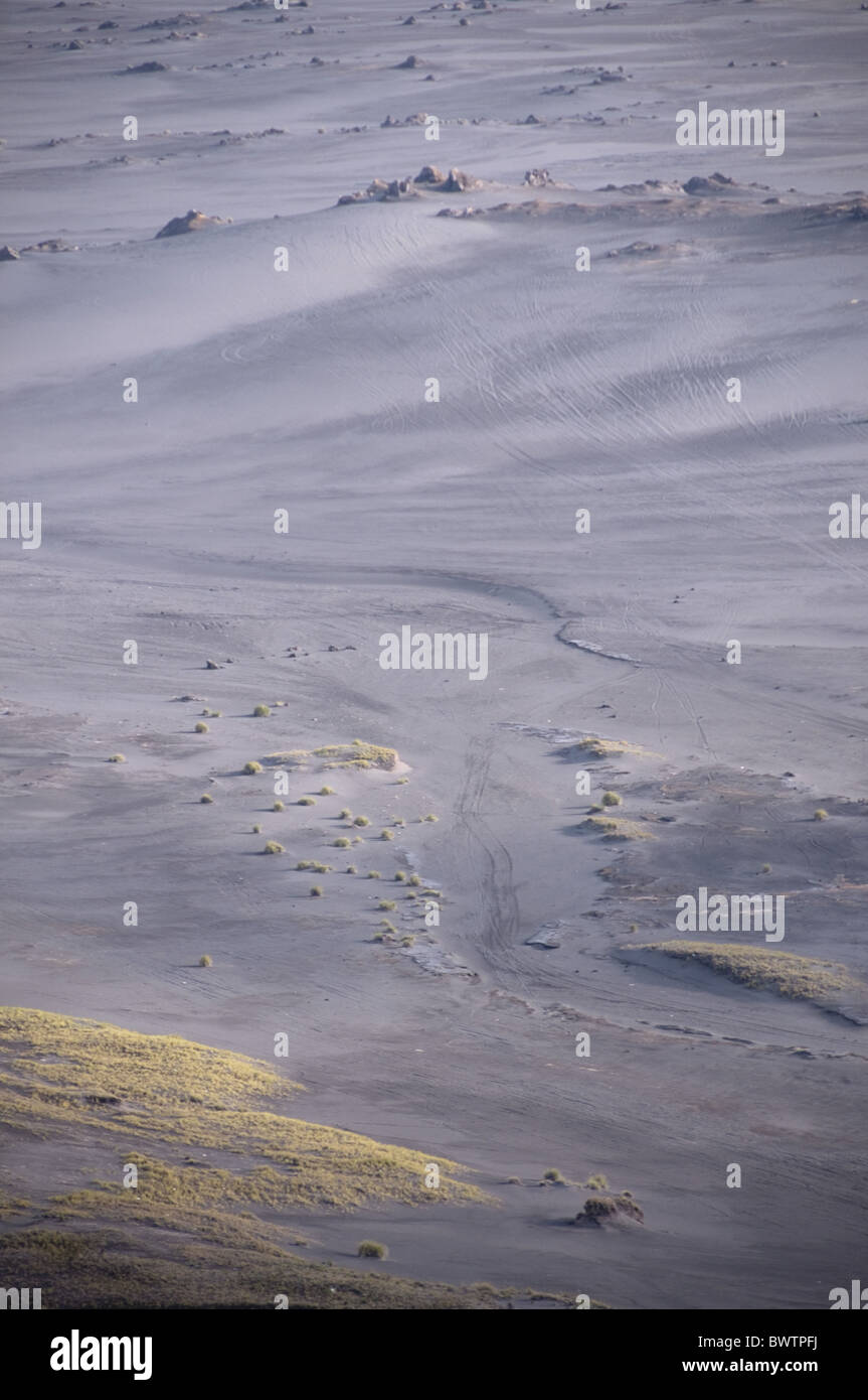 Sand plain surrounding volcanoes, 'Sea of Sand', near Mount Bromo and ...