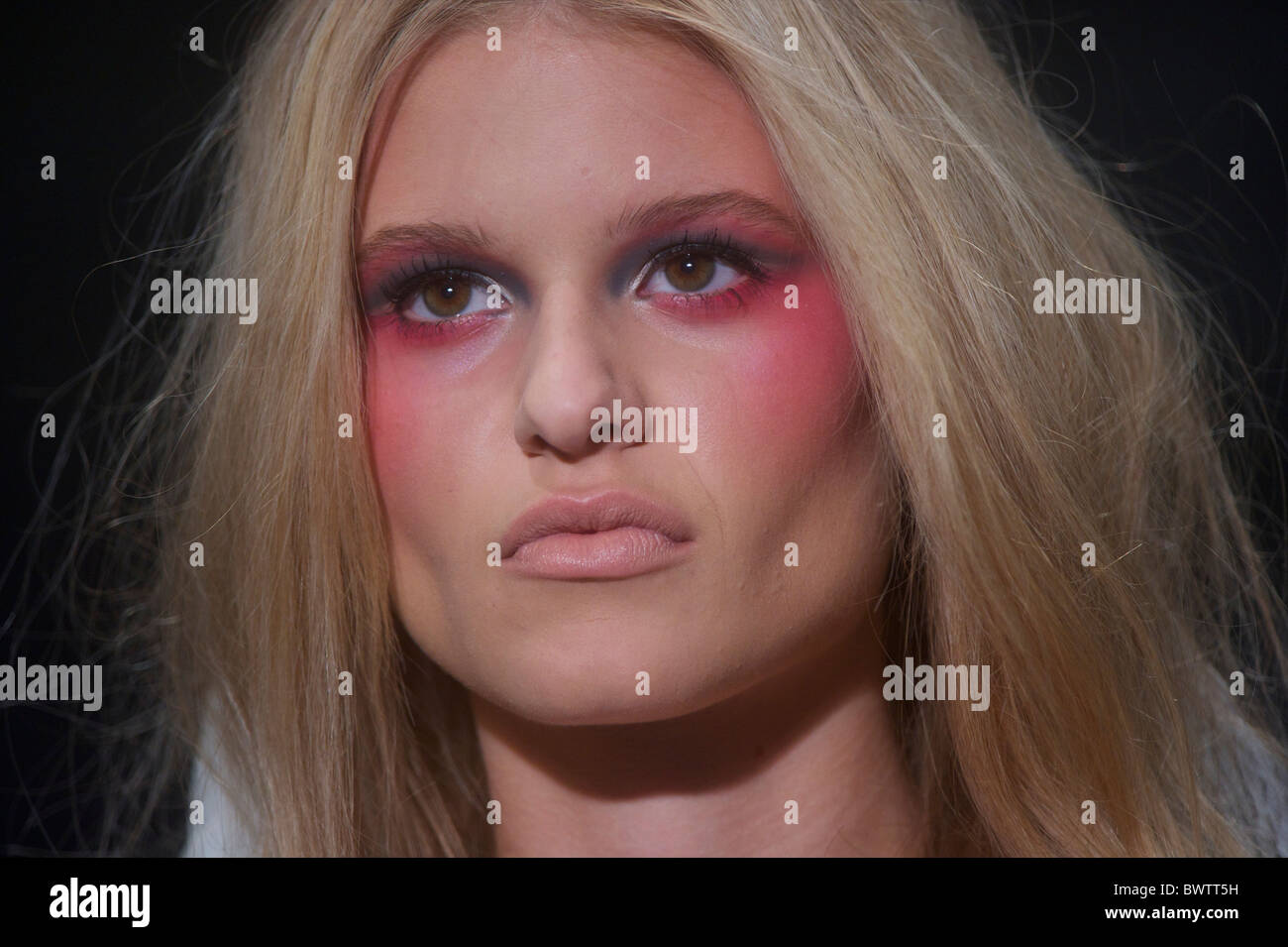 Models exhibit the Jean-Pierre Braganza spring 2011 collection down the ...