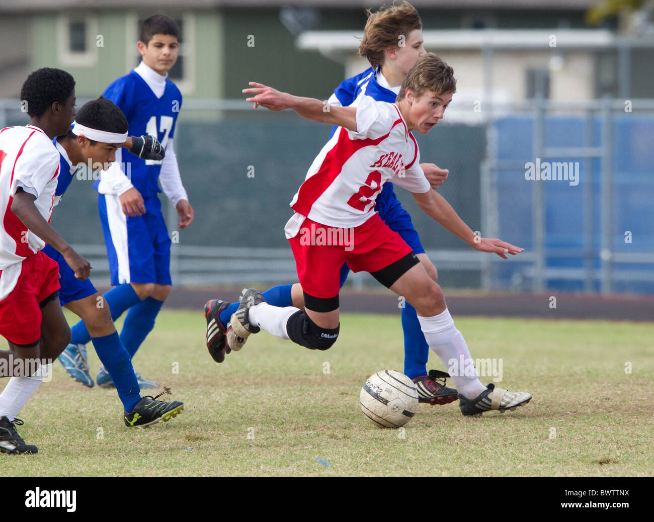 Seventh and eighth grade boys ages 13 and 14 play soccer for their ...