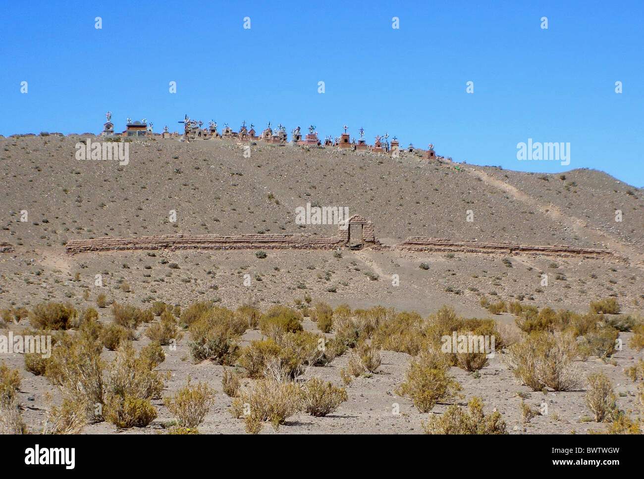 Graveyard placed remote hilltop near saltlake dry Stock Photo - Alamy