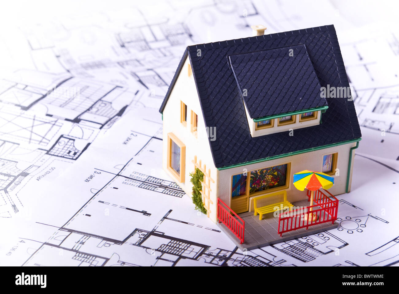 cartoon home over plans Stock Photo - Alamy