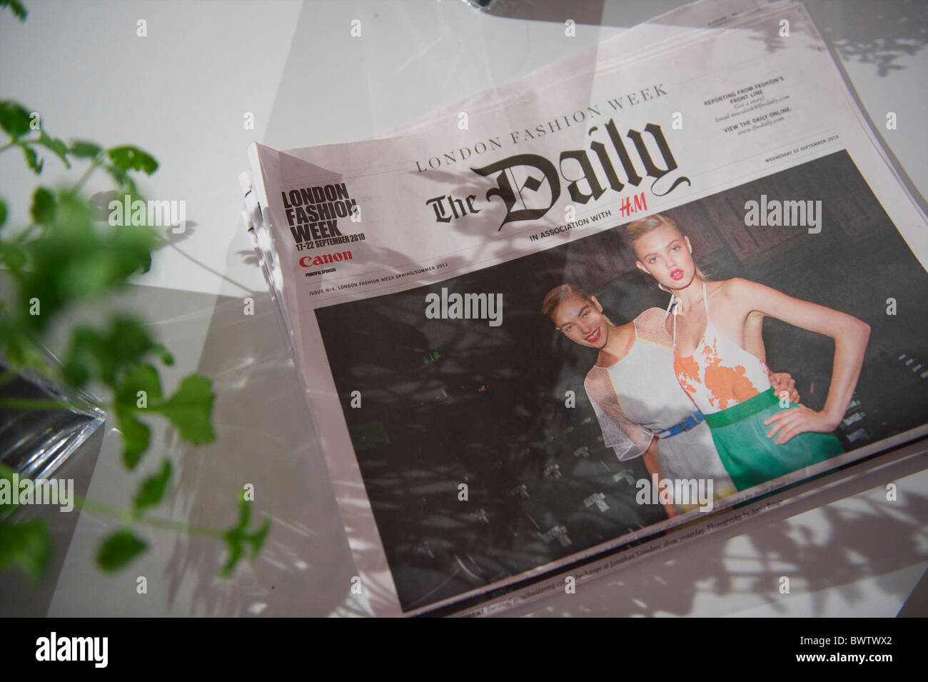A copy of the The London Fashion Week Daily newspaper lies discarded on ...