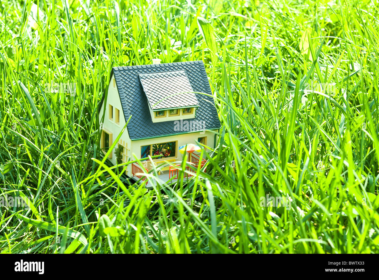 house on grass Stock Photo - Alamy