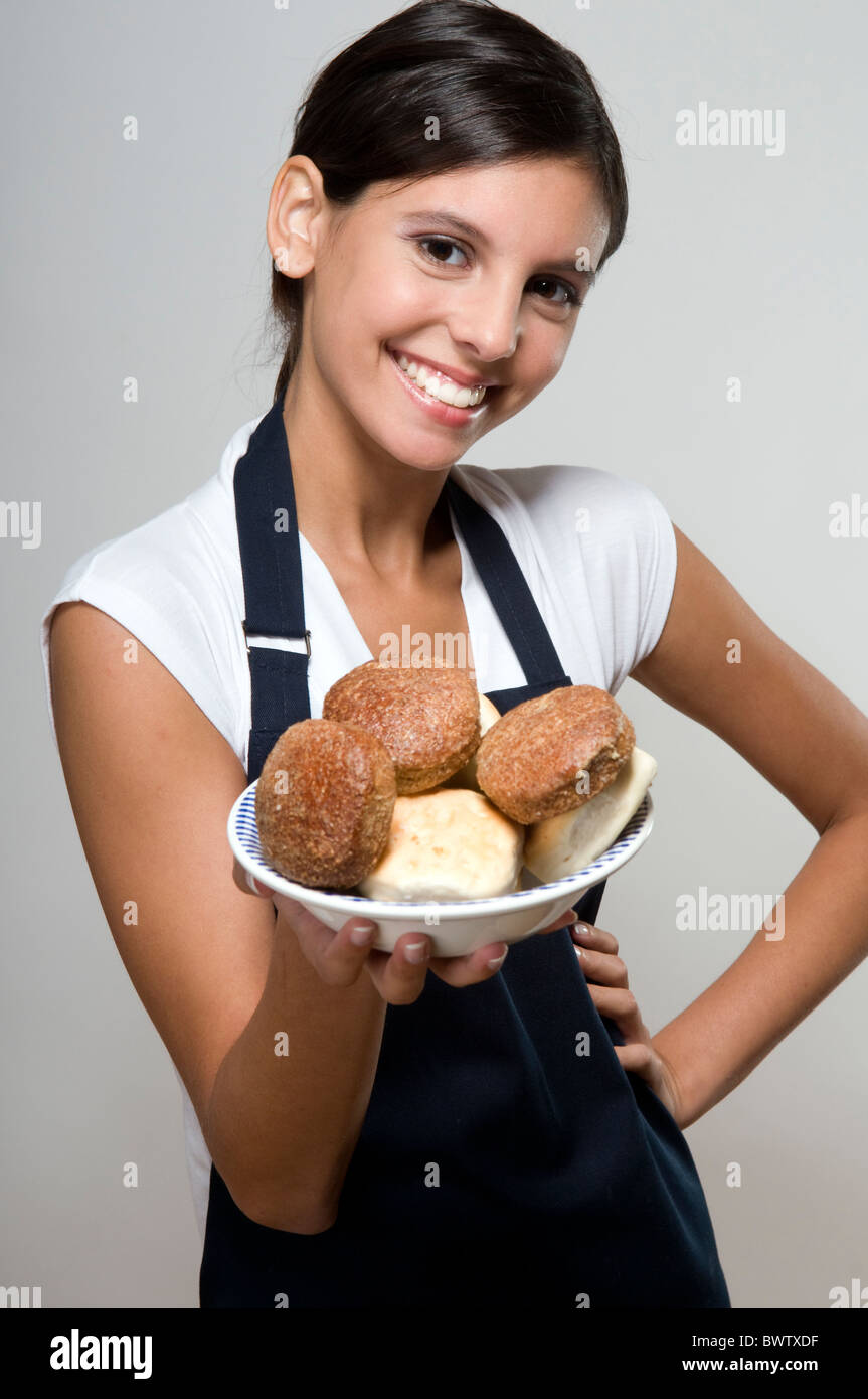 Waitress with a bread basket Stock Photo - Alamy