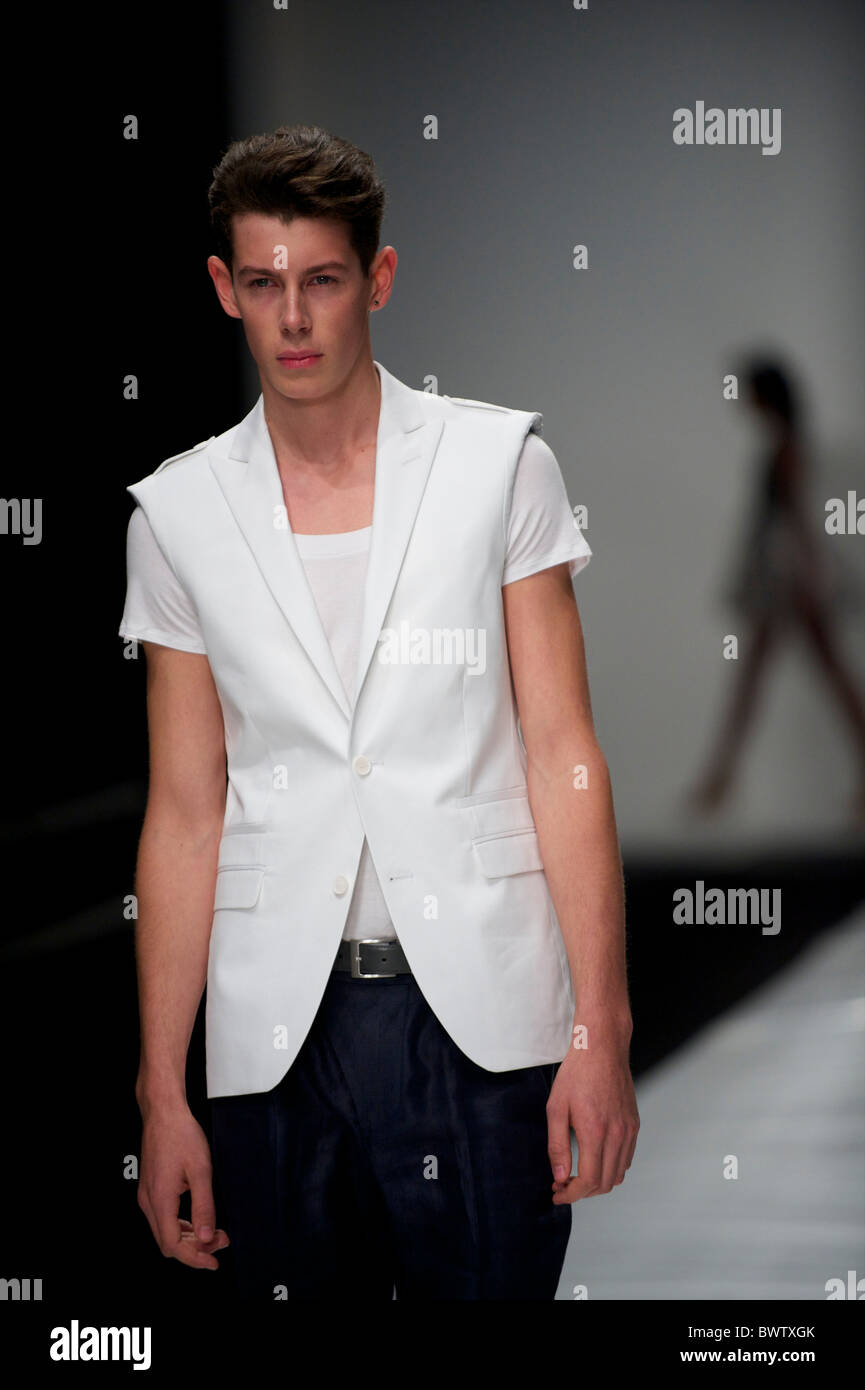 Models exhibit the Paul Costelloe spring 2011 collection down the ...