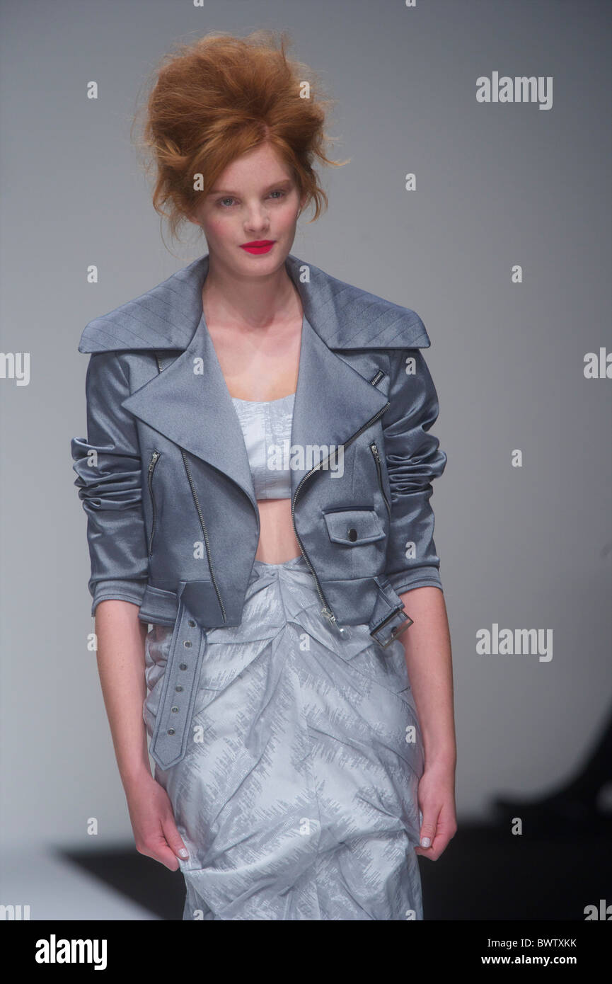 Models exhibit the Paul Costelloe spring 2011 collection down the ...