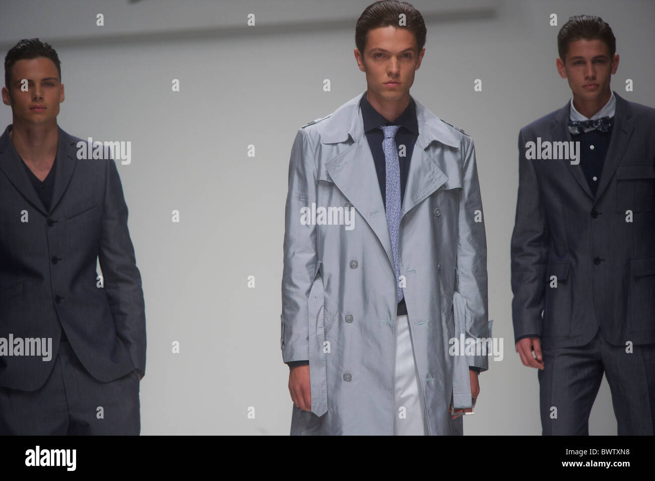 Models exhibit the Paul Costelloe spring 2011 collection down the ...