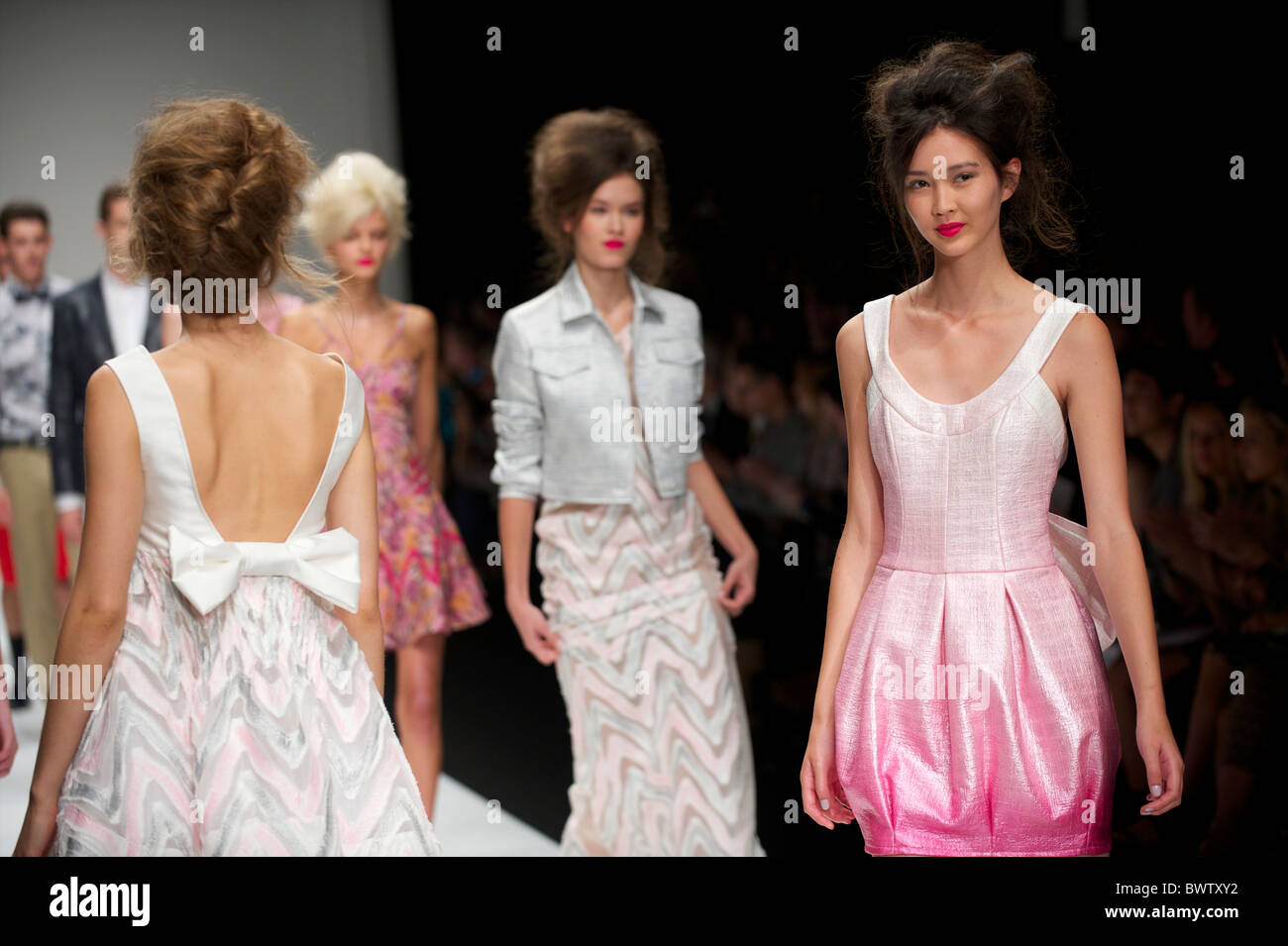 Models exhibit the Paul Costelloe spring 2011 collection down the ...