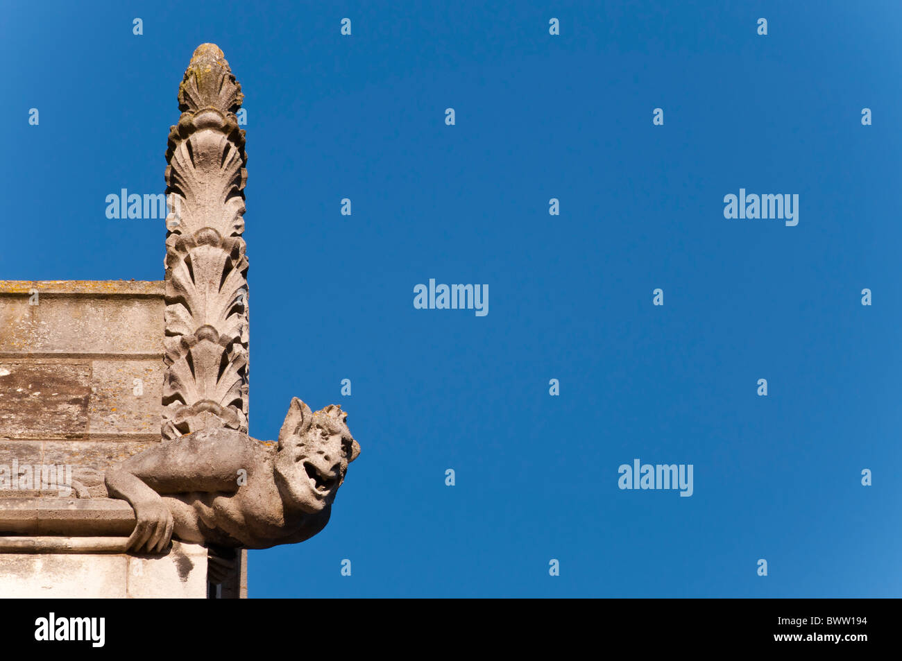Gargoyle on a corner of Winchester Cathedral Landscape. Portrait ...
