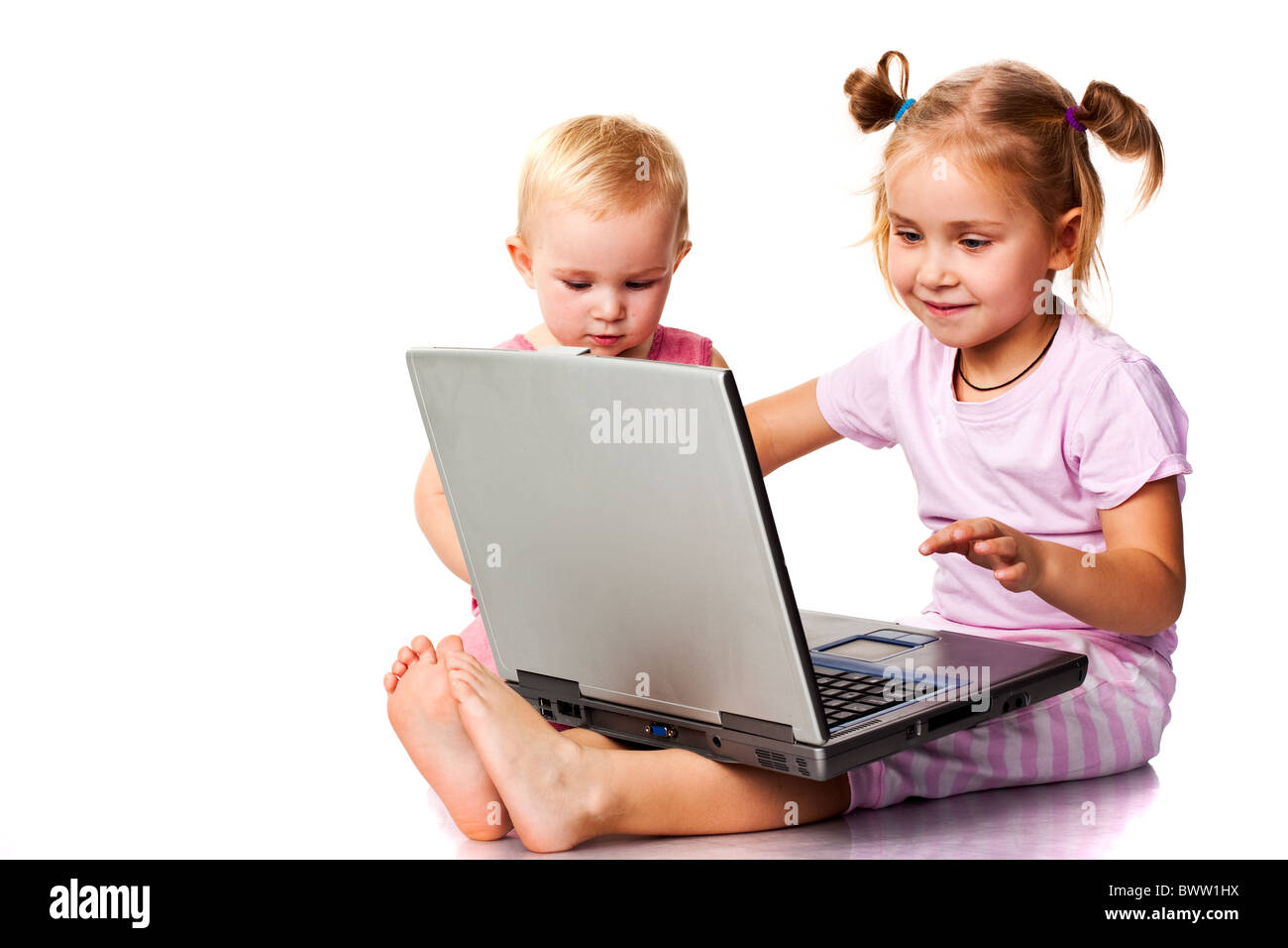 Children playing on laptop isolated on white Stock Photo - Alamy