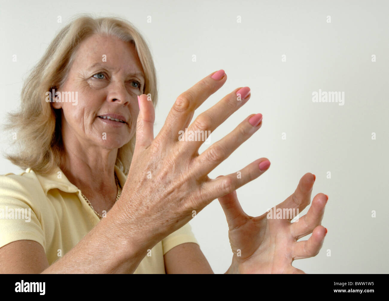 Senior portrait woman seniors hand hands gesture gesticulating ...