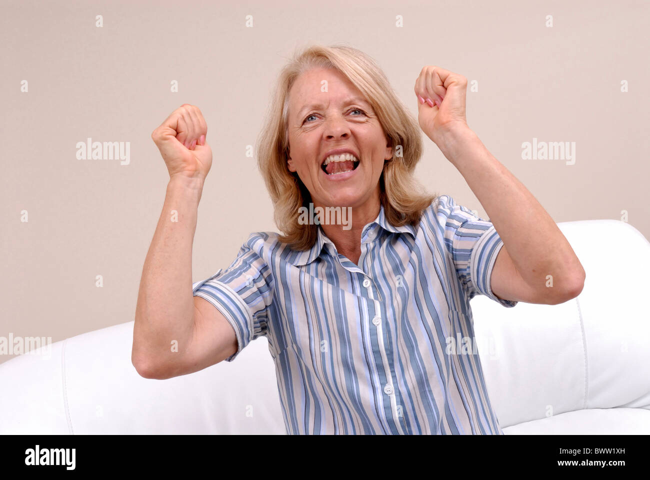 Woman Senior Seniors Mature Living room at Home Portrait Rejoicing joy ...