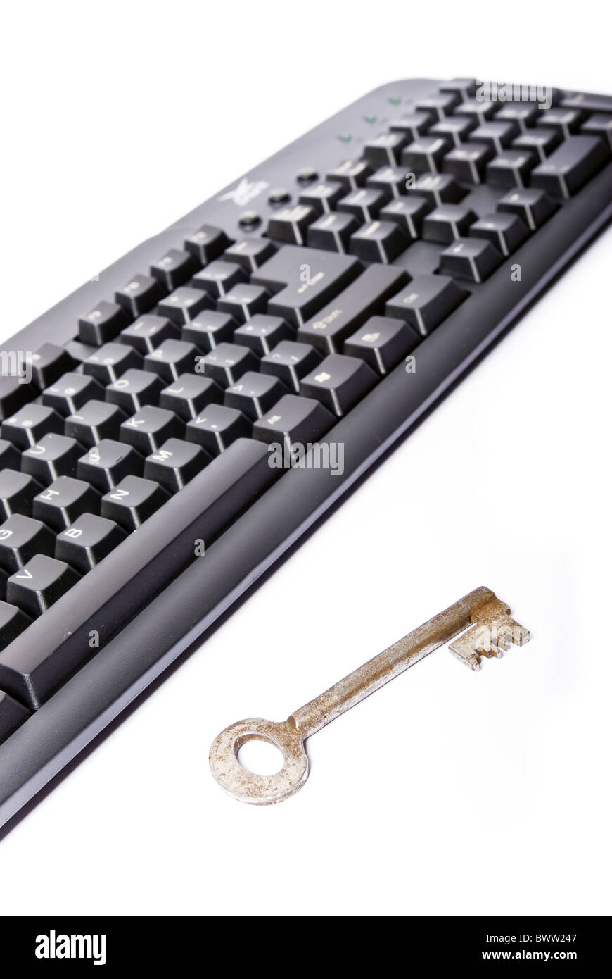 old key with keyboard on white Stock Photo - Alamy