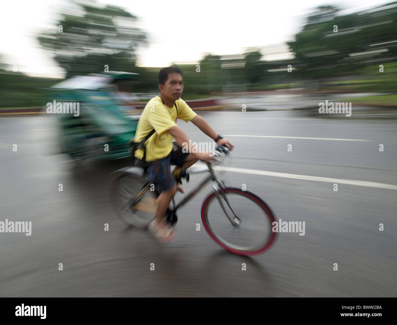 Bicycle rider in Manila Stock Photo - Alamy