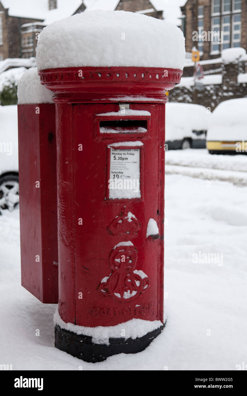 A red pillar box in Sharrowvale Road,Sheffield after a heavy snow storm ...