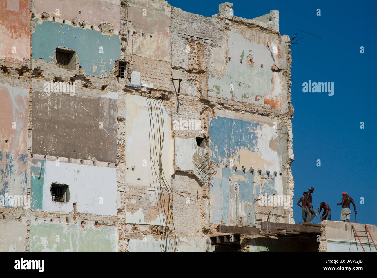 Men working on a construction site, Havana, Cuba Stock Photo - Alamy