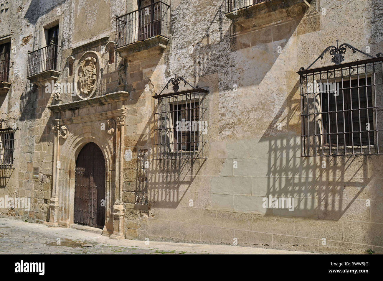 Medieval building with door barred windows Stock Photo - Alamy