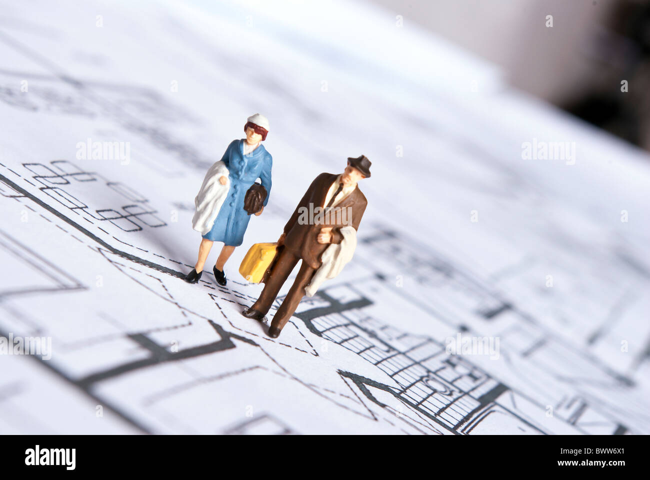 miniature people on plans Stock Photo - Alamy