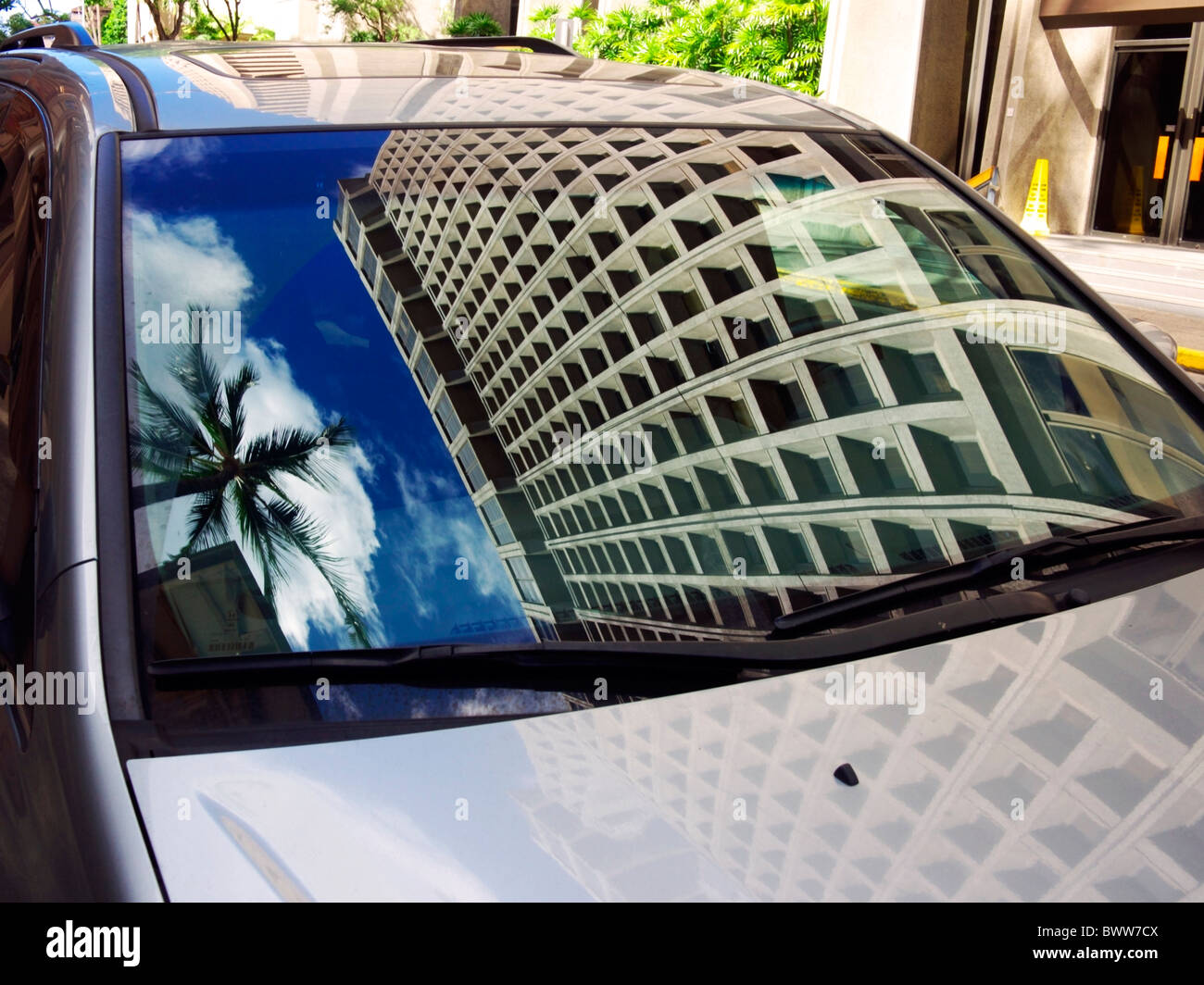 Highrise and sky reflecting in windshield Stock Photo - Alamy