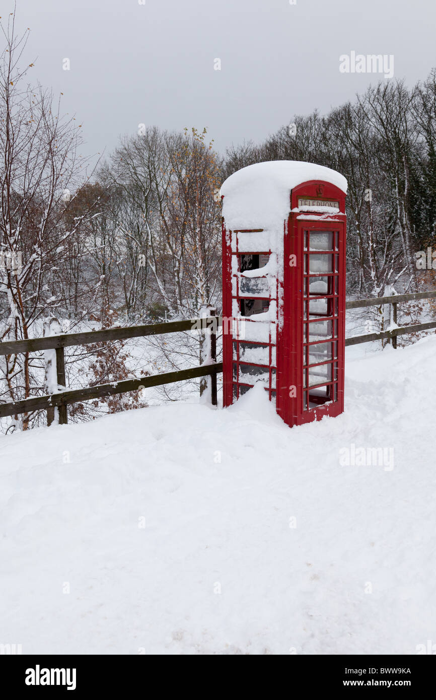 A traditional red telephone box designed by Sir Giles Gilbert Scott, is ...