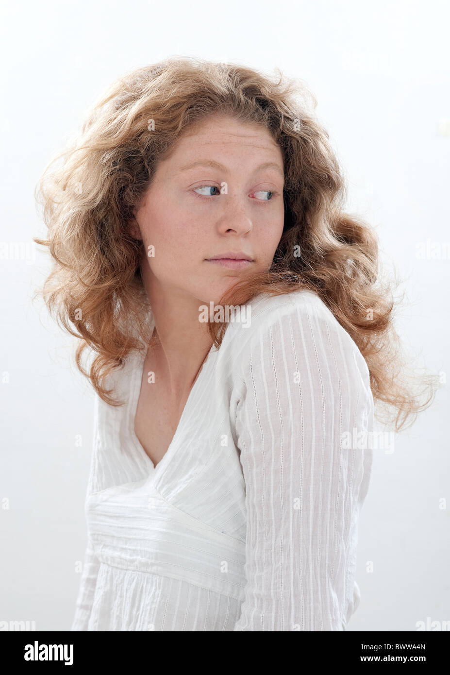 young woman looking back Stock Photo - Alamy