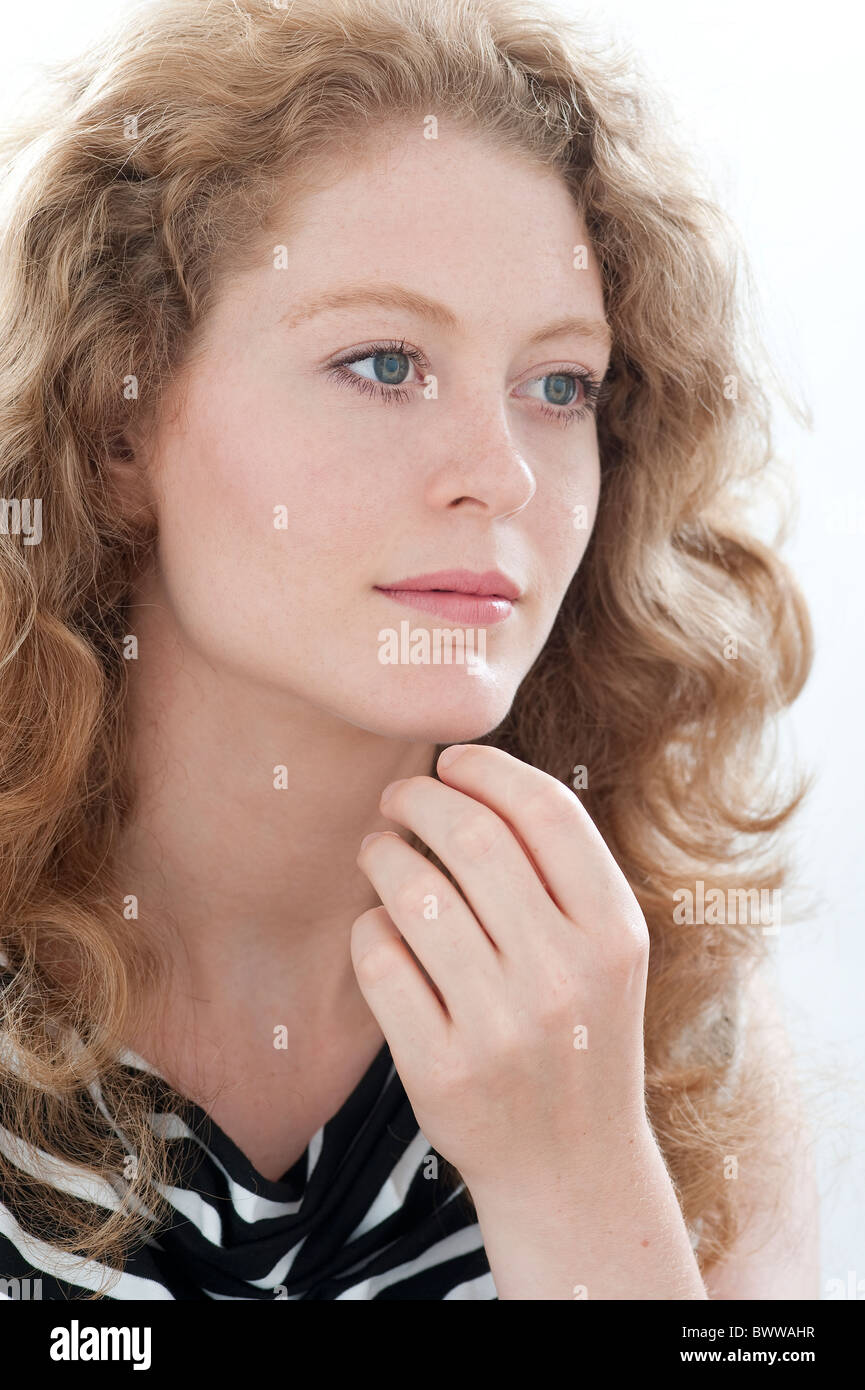 beautiful woman in deep thought Stock Photo - Alamy
