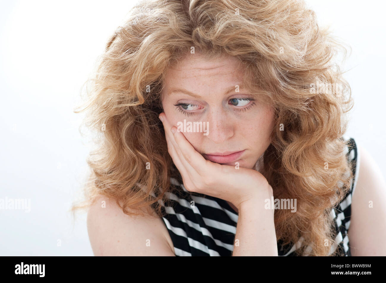 woman looking worried Stock Photo - Alamy