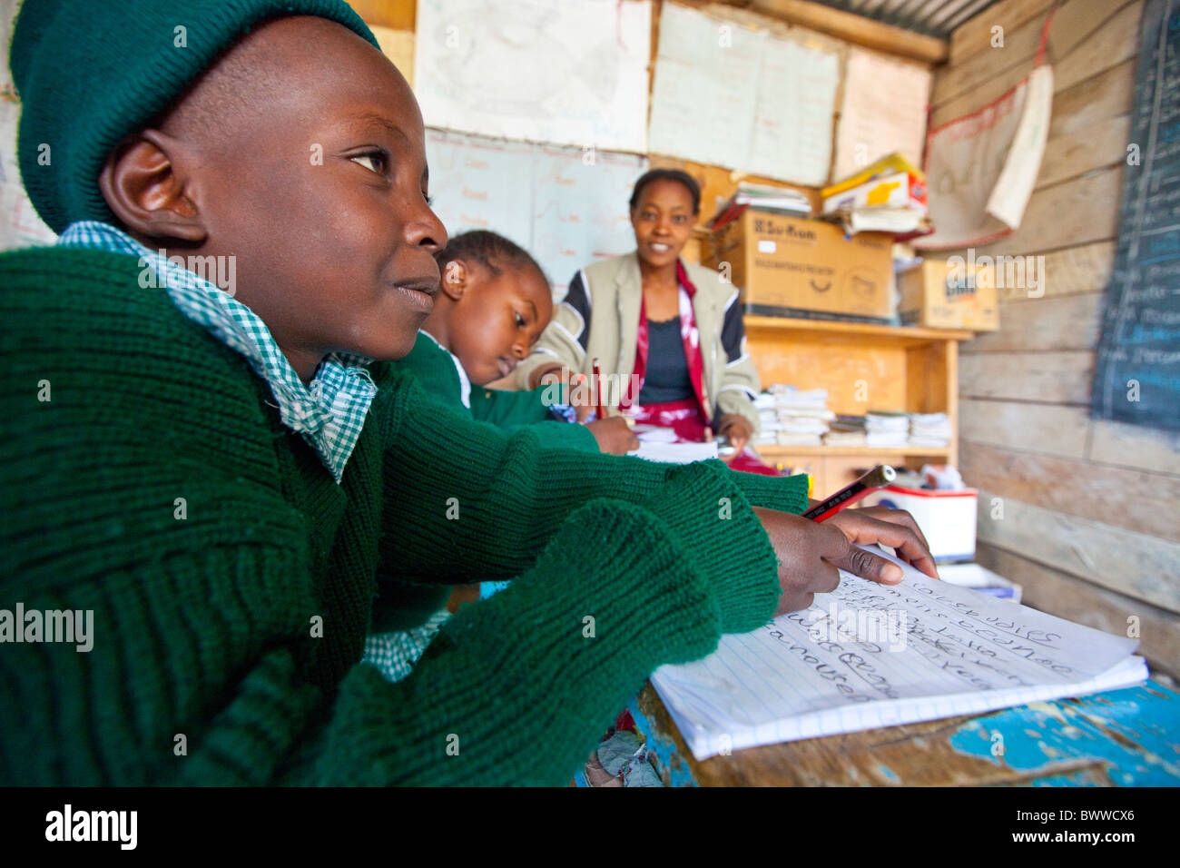 Teacher and schoolchildren from Mathare slums at Maji Mazuri Centre and ...