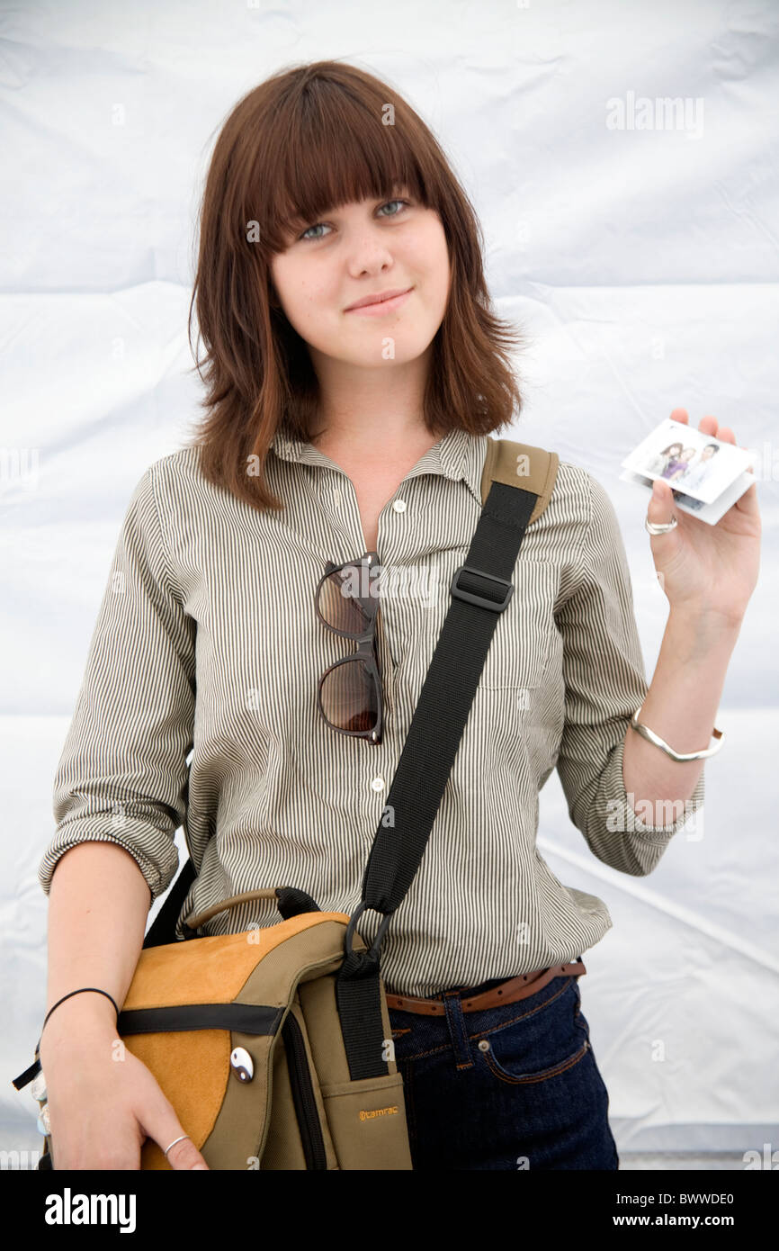 Portrait of girl holding picture Stock Photo - Alamy